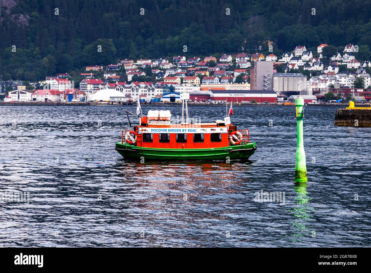 Small harbor ferry Vaagen (Vågen) arriving in the port of Bergen ...
