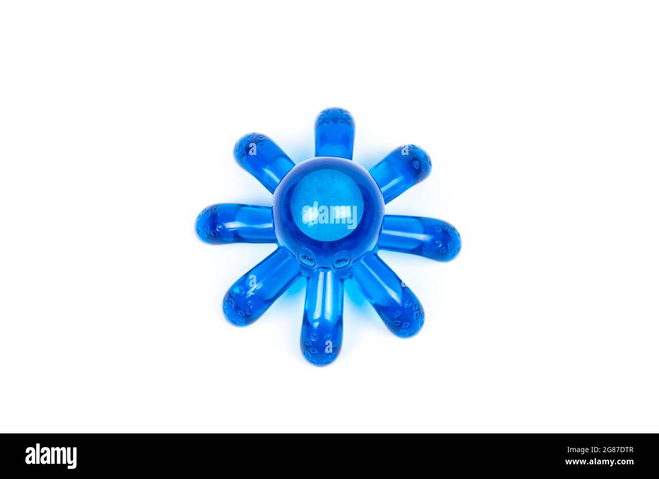 Body massager in the shape of an octopus. Blue plastic body massager on ...