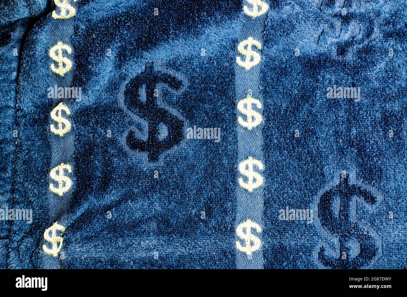 Stuff with a dollar sign. Blue terry surface with golden dollar signs ...