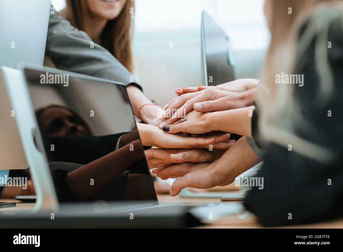 Business people joining hands over hi-res stock photography and images ...