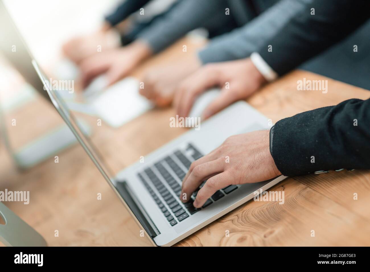 close up. image working group working on laptops. photo with copy space ...