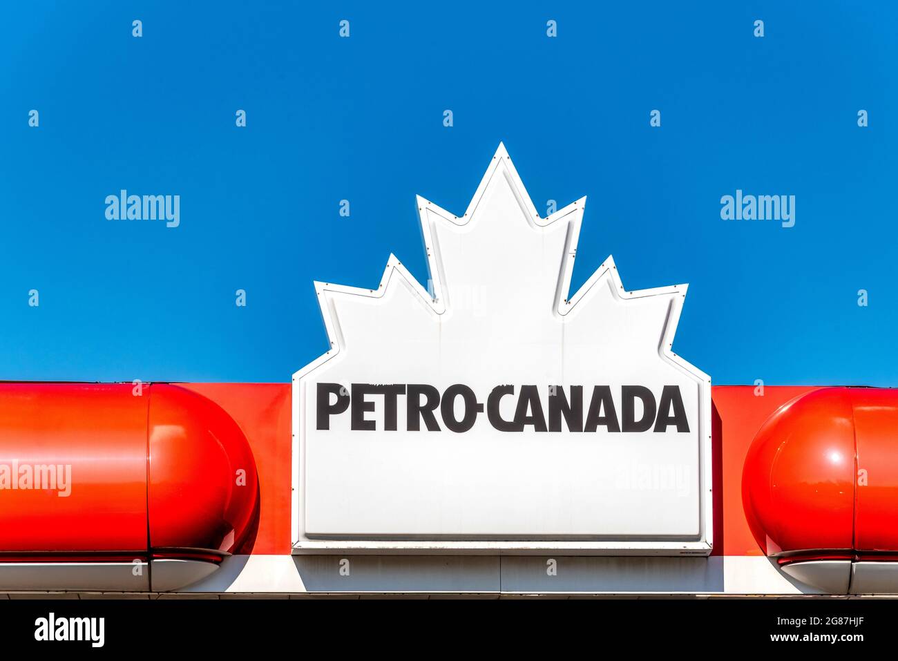 Petro-Canada sign in blue sky, toronto, canada Stock Photo - Alamy
