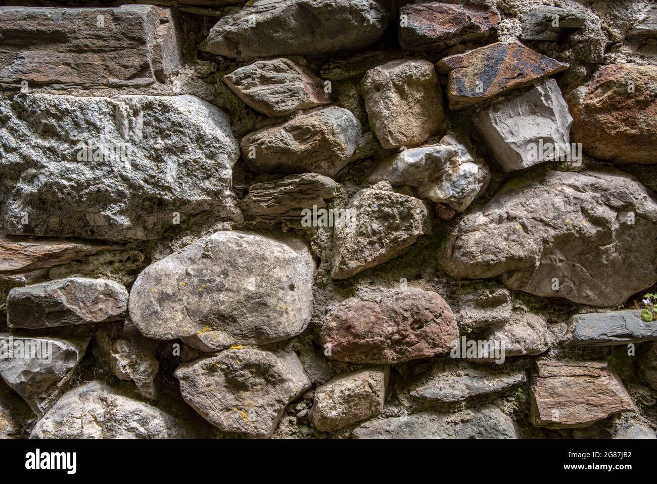 Natural stone wall as texture or background Stock Photo - Alamy
