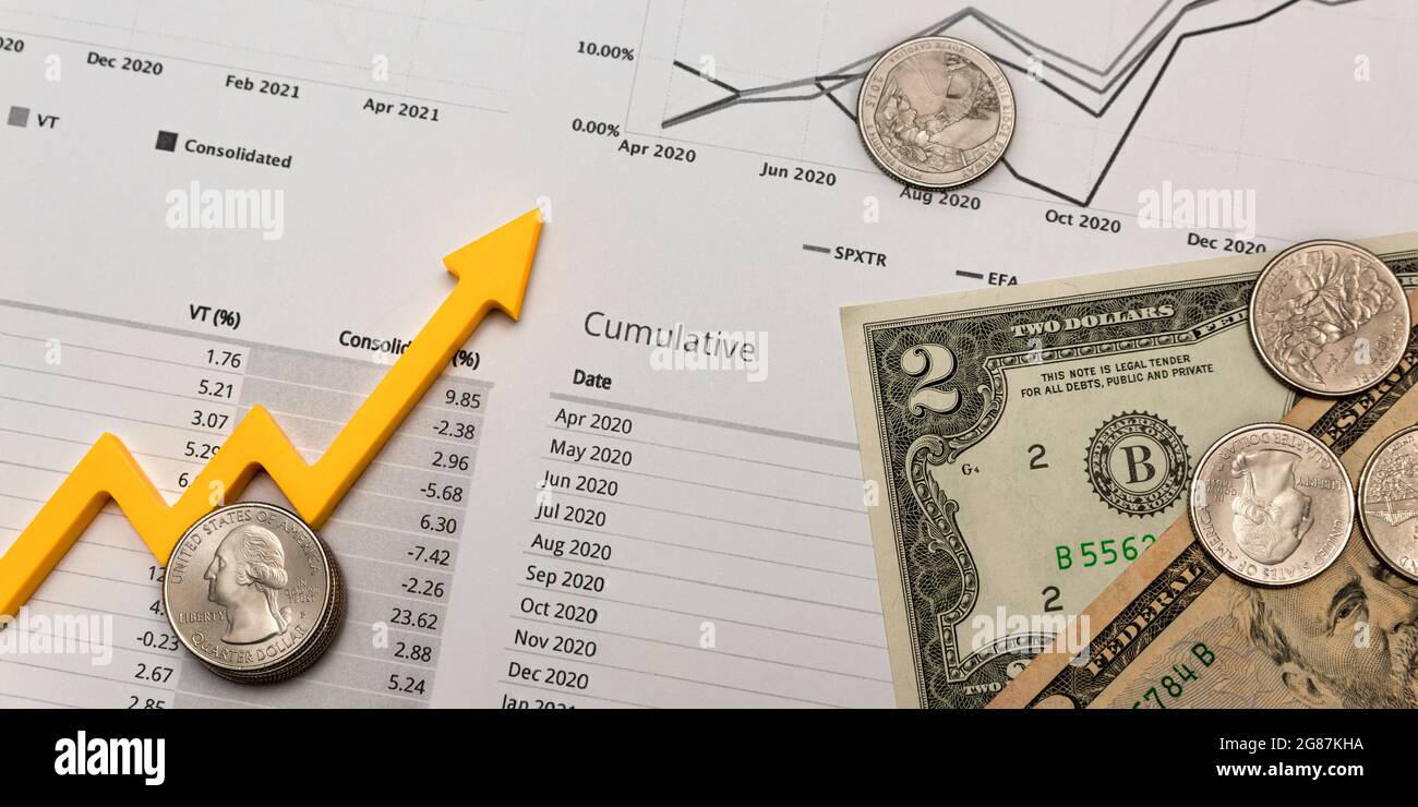 investment report, financial quarterly report, money on a printed sheet ...