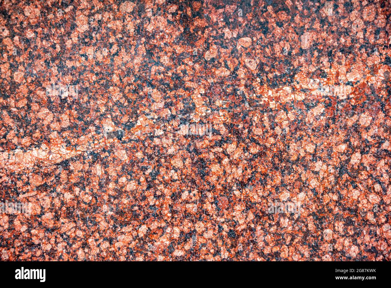 A closeup of a red granite slab can be used as a background Stock Photo ...