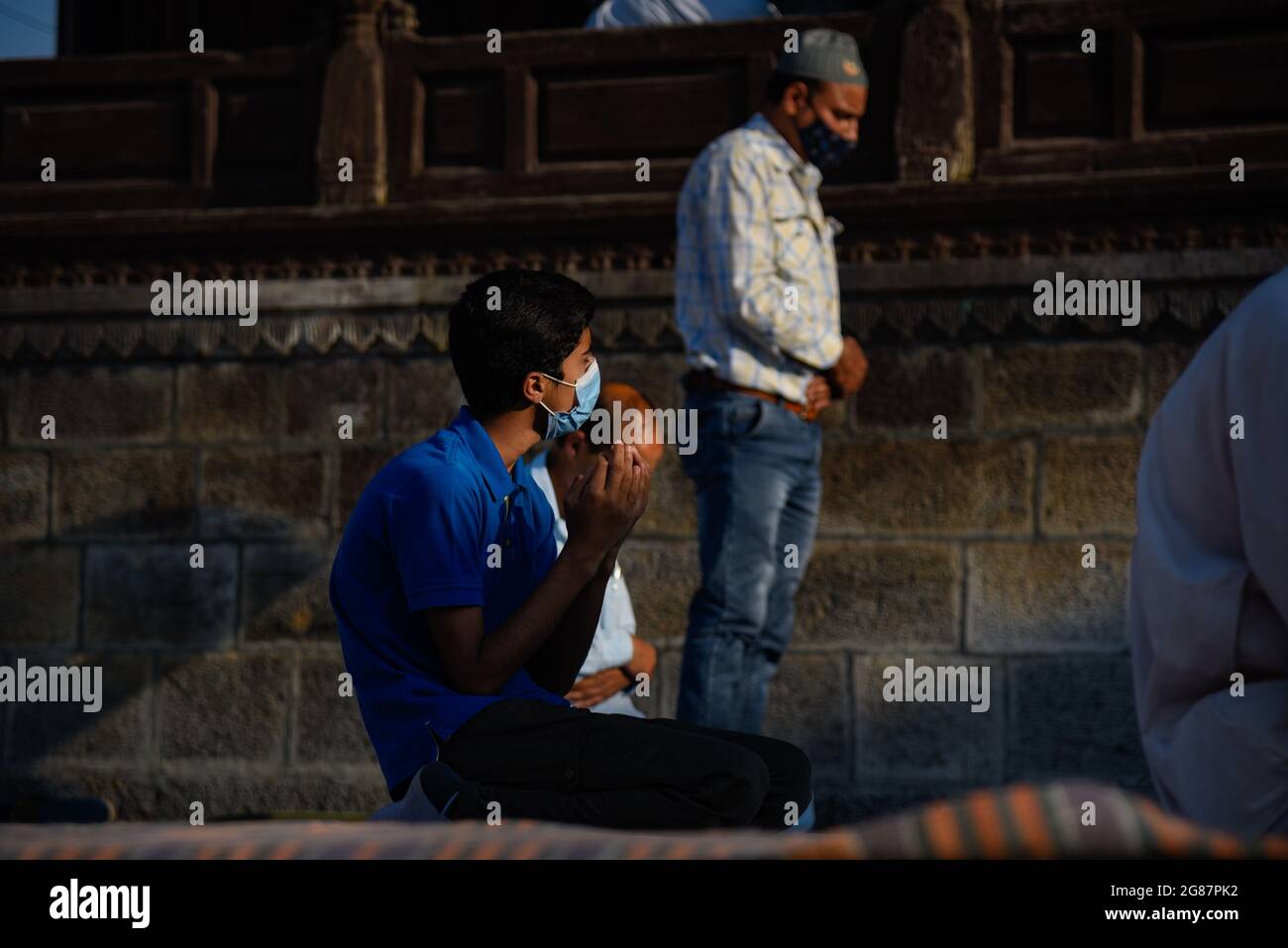 Kashmiri Muslims pray outside the shrine of Sufi Saint Syed Ali ...
