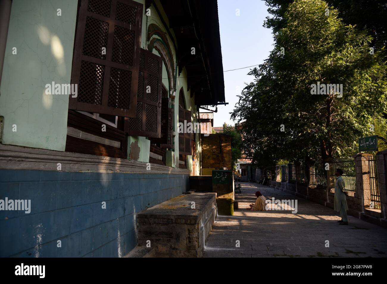 A Kashmiri Muslim woman pray outside the shrine of Sufi Saint Syed Ali ...