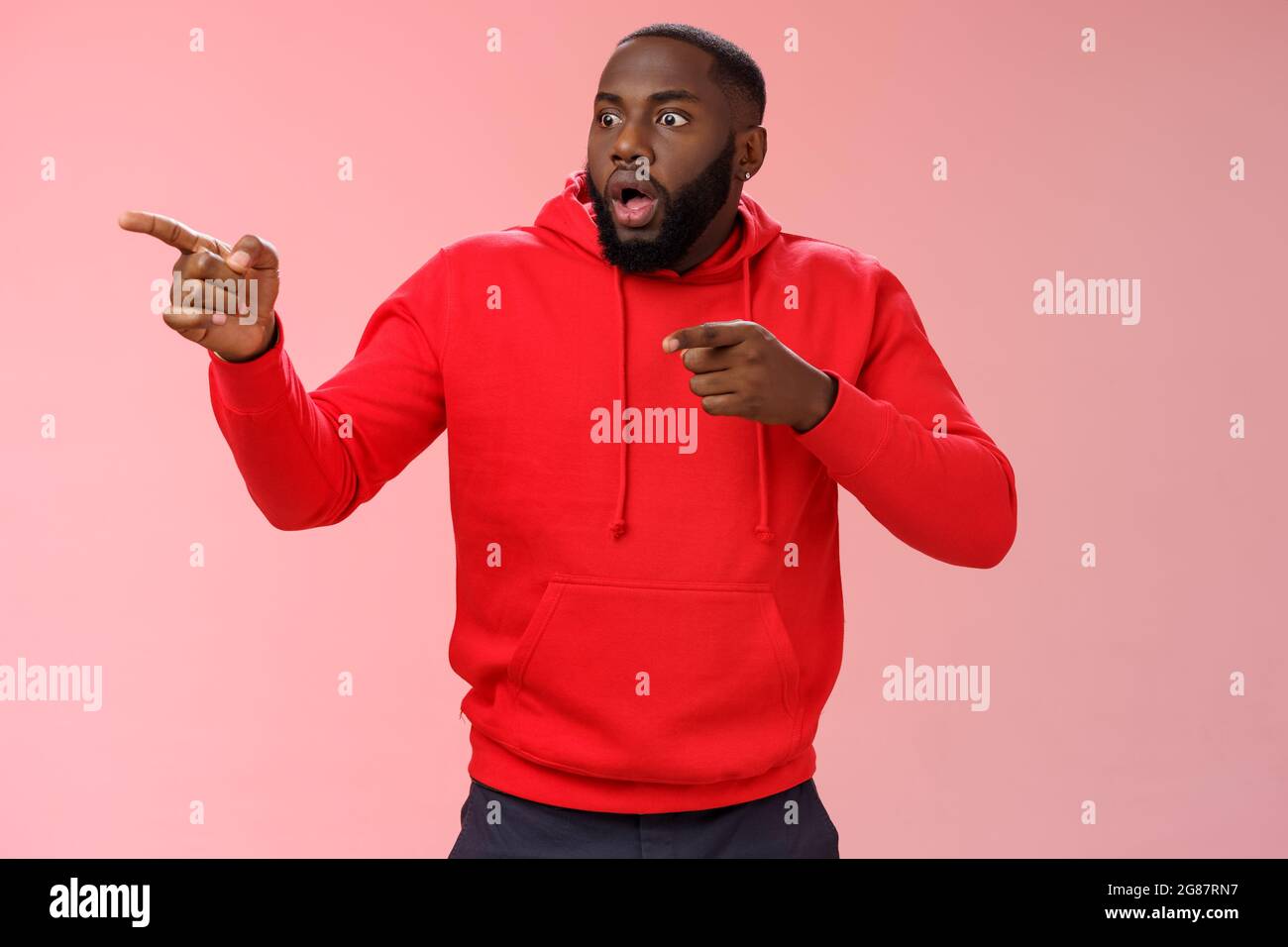 Shocked stunned man widen eyes gasping drop jaw standing stupor ...