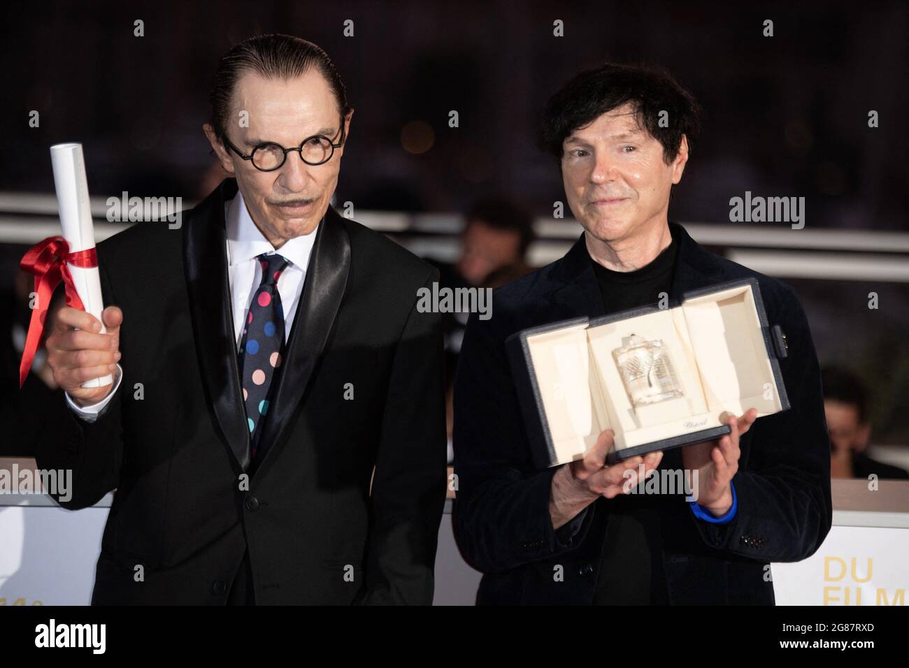 Russell Mael and Ron Mael pose with the Best Director Award in the name ...