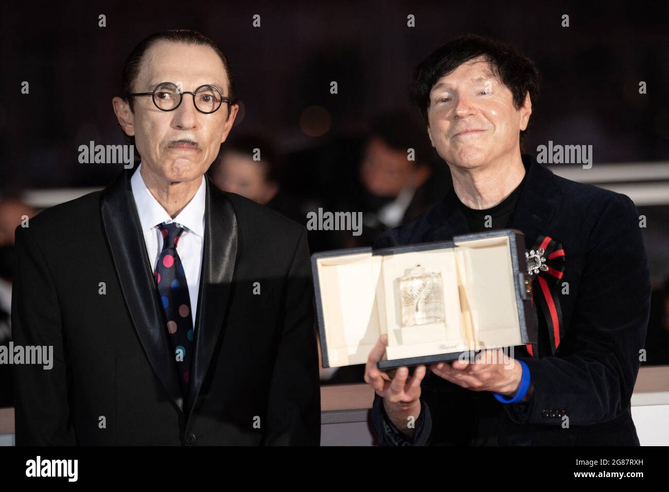 Russell Mael and Ron Mael pose with the Best Director Award in the name ...