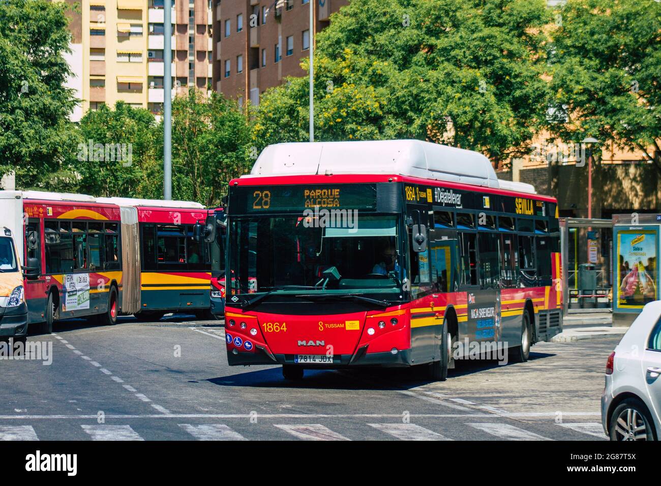 Seville Spain July 09, 2021 Bus driving through the streets of Seville ...