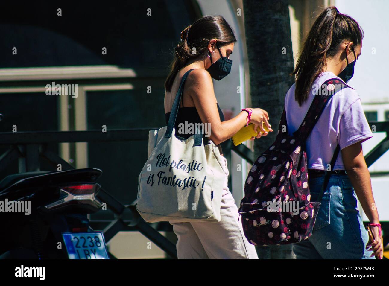 Seville Spain July 09, 2021 Pedestrians walking in the streets of ...