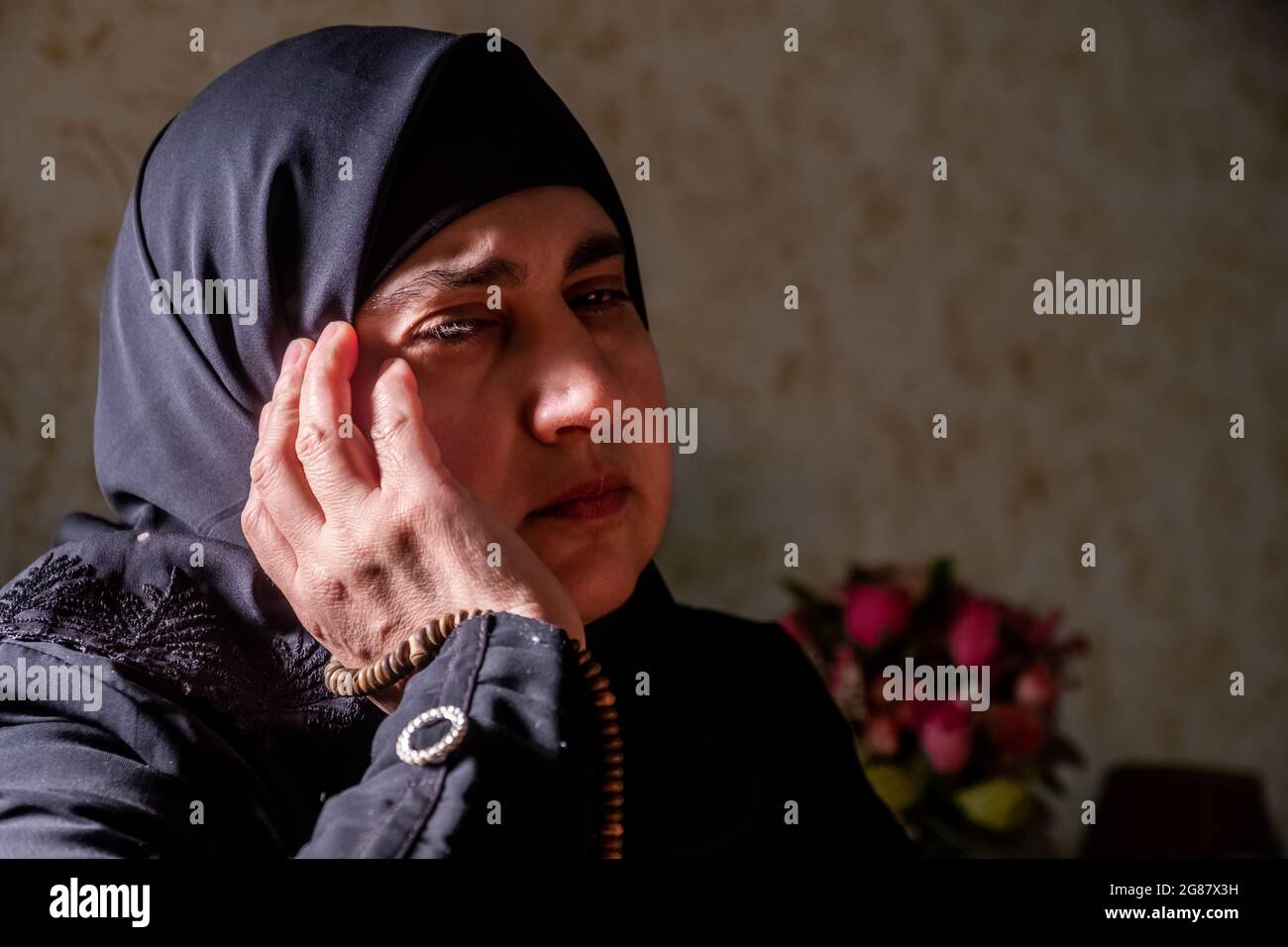 Muslim woman praying for Allah with her feelings of devotion and ...