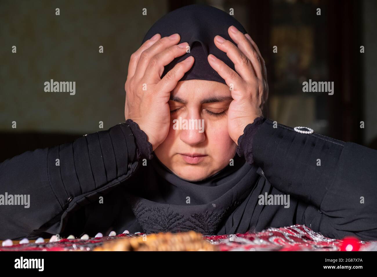 Muslim woman praying for Allah with her feelings of devotion and ...