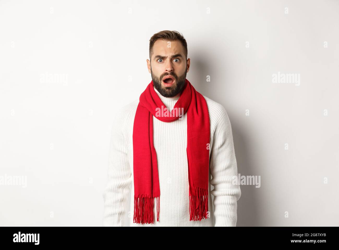 Christmas holidays and celebration concept. Confused bearded guy ...