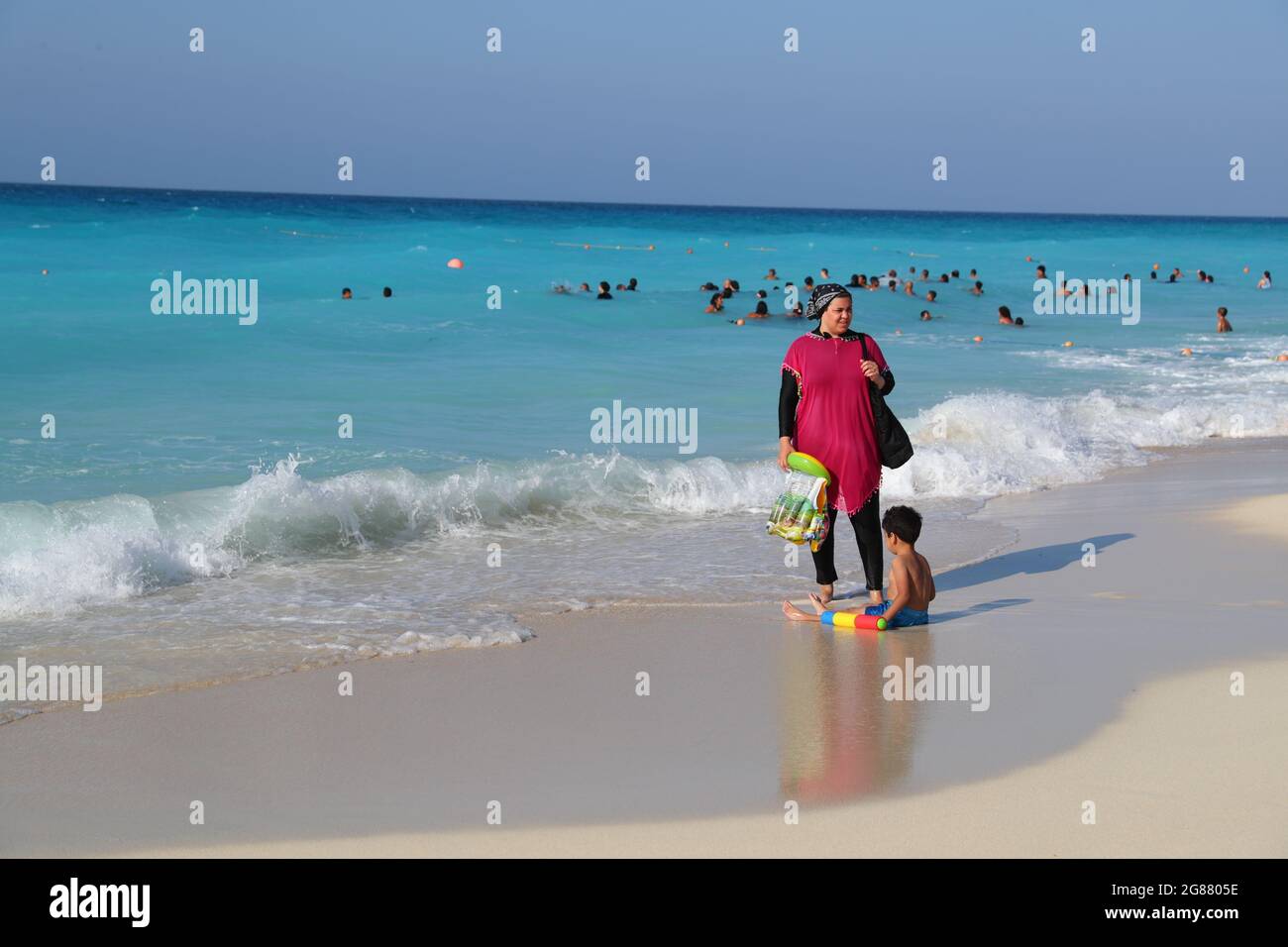 El Alamein, Egypt. 17th July, 2021. People enjoy themselves on the ...