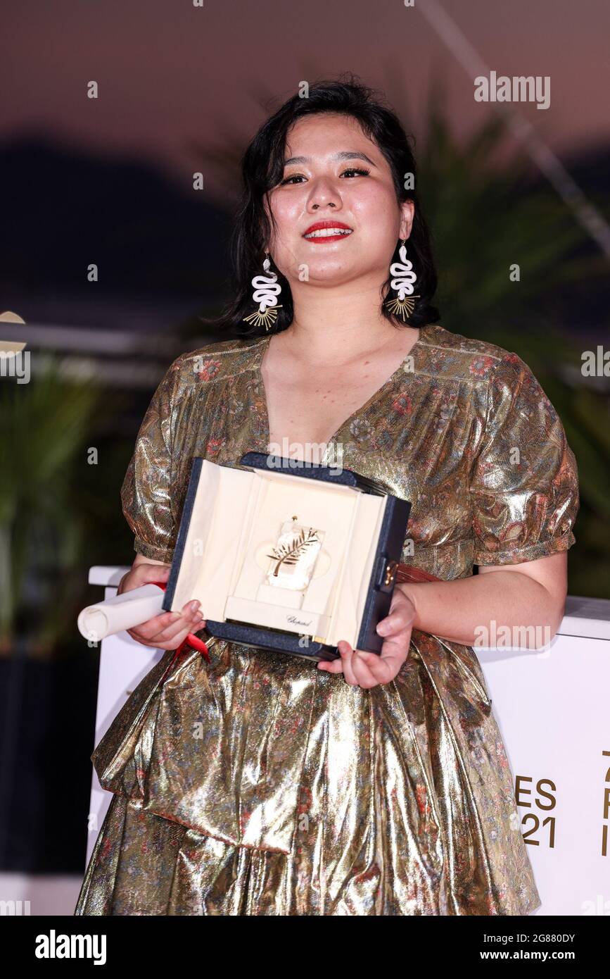 CANNES - JULY 17: Tang Yi pose with the Best Short Movie Award at the ...
