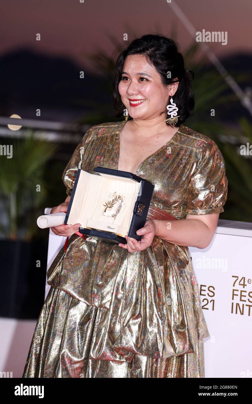 CANNES - JULY 17: Tang Yi pose with the Best Short Movie Award at the ...