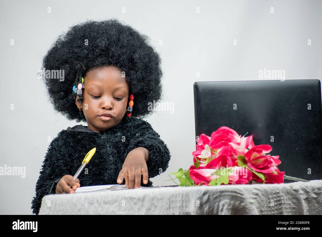 African child reading back view hi-res stock photography and images - Alamy