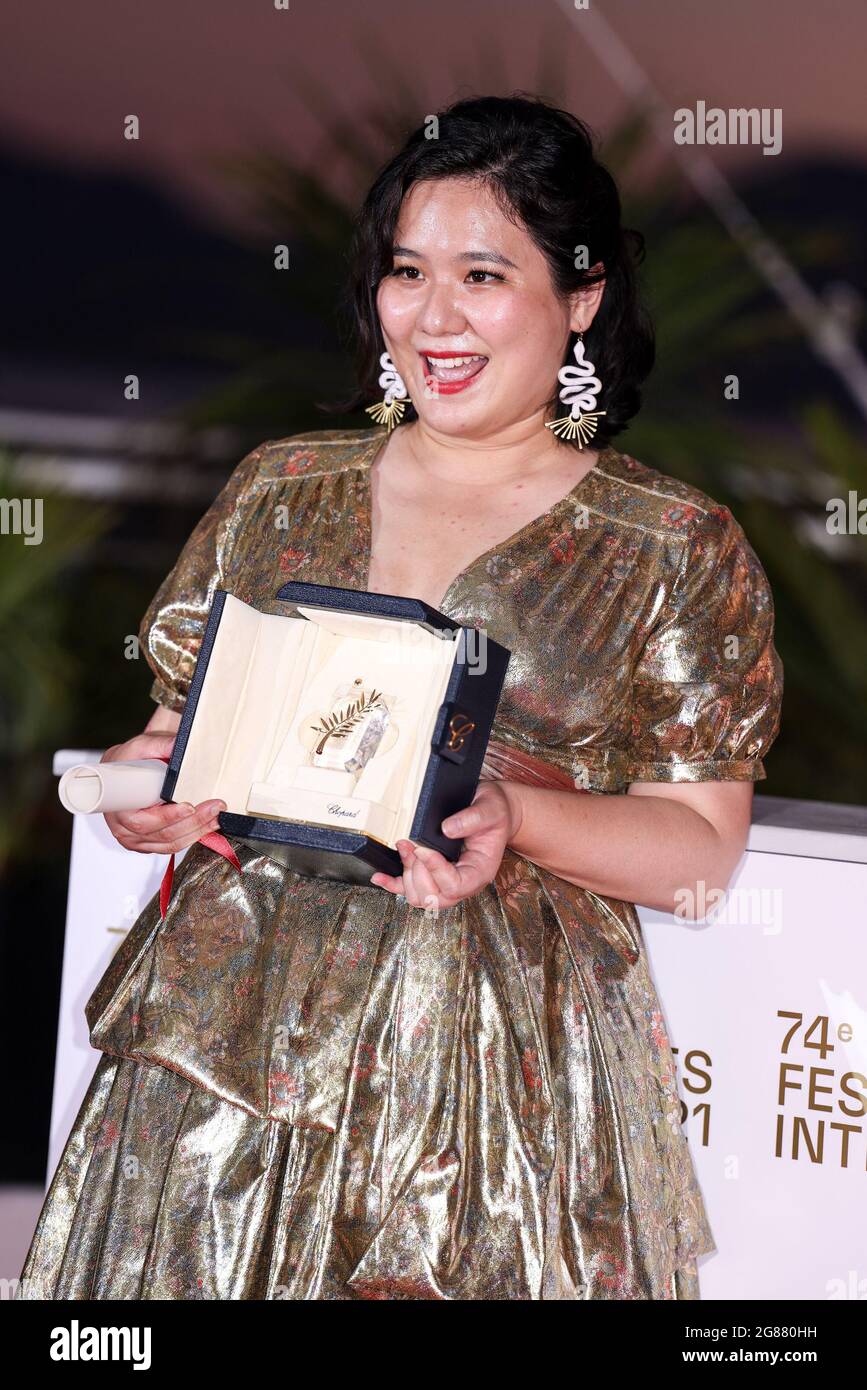 CANNES - JULY 17: Tang Yi pose with the Best Short Movie Award at the ...