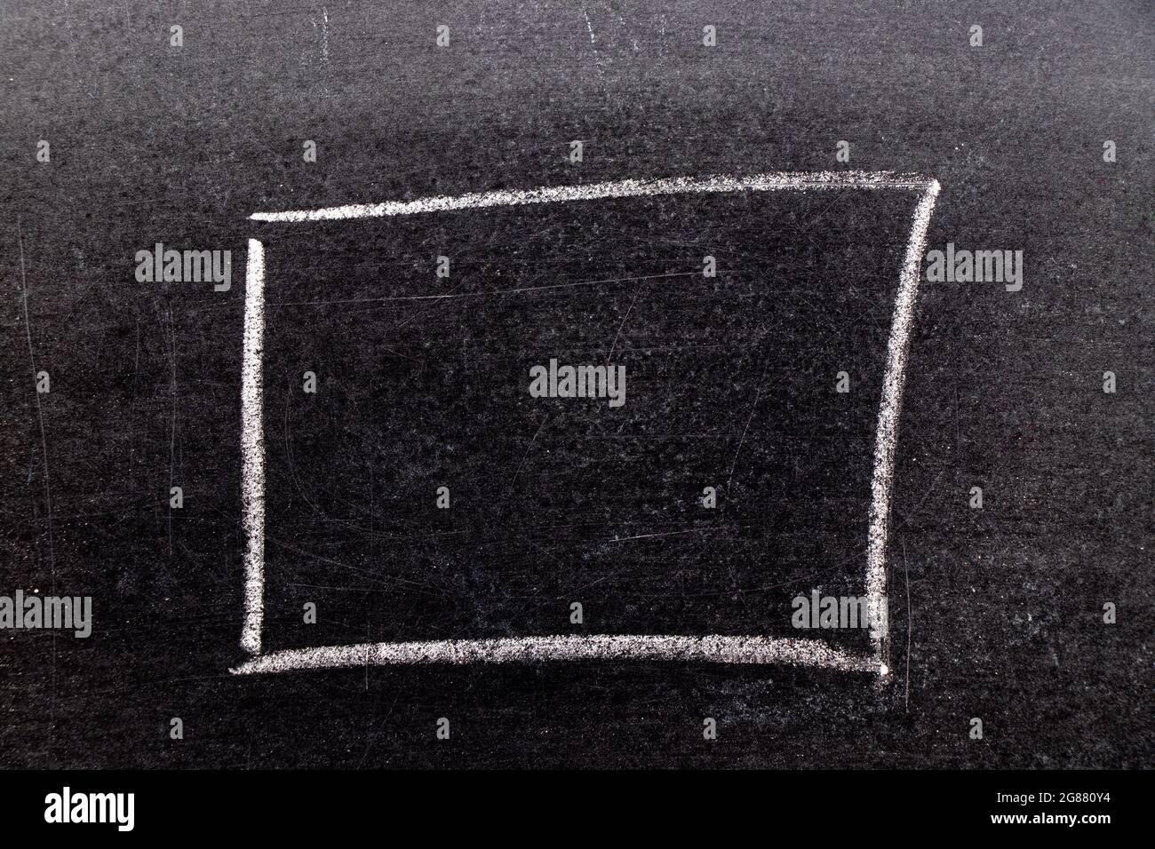 White chalk hand drawing in square or banner shape on black board ...