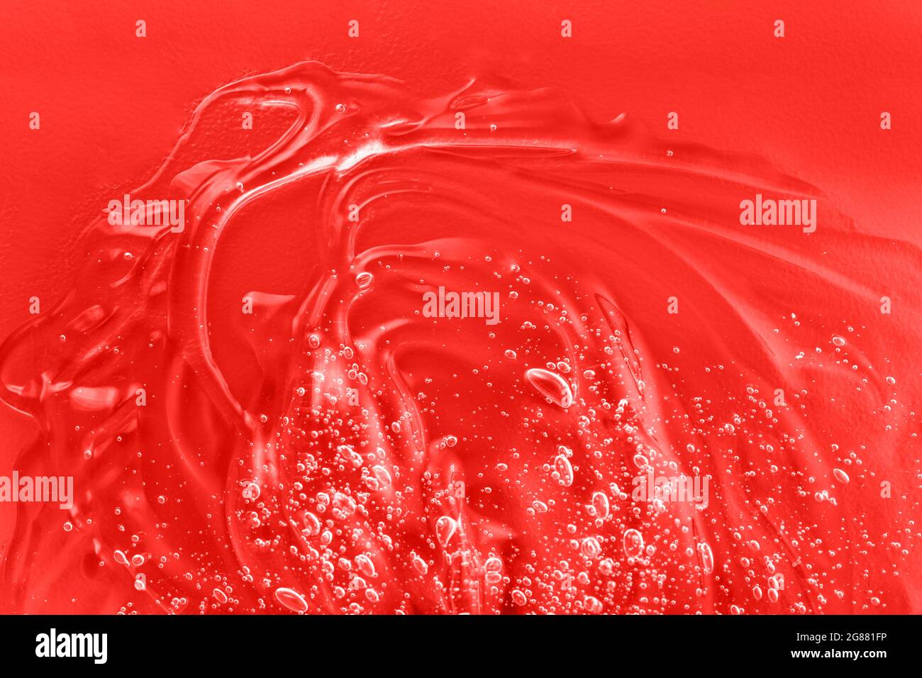 Red moisturizer smear smudge. Gel texture with bubbles. Jelly cleanser ...