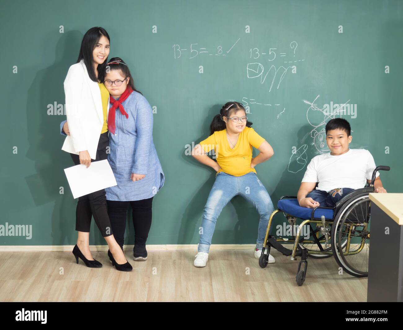 Spacial classroom of disabled kids or autism child learning and playing ...