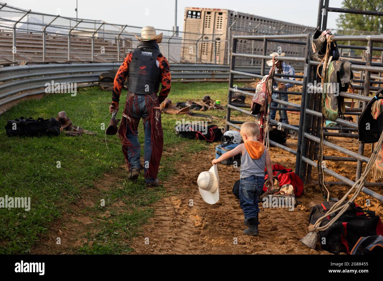 A boy carries his cowboy hat during the 3 Bar J Rodeo at the Monroe ...