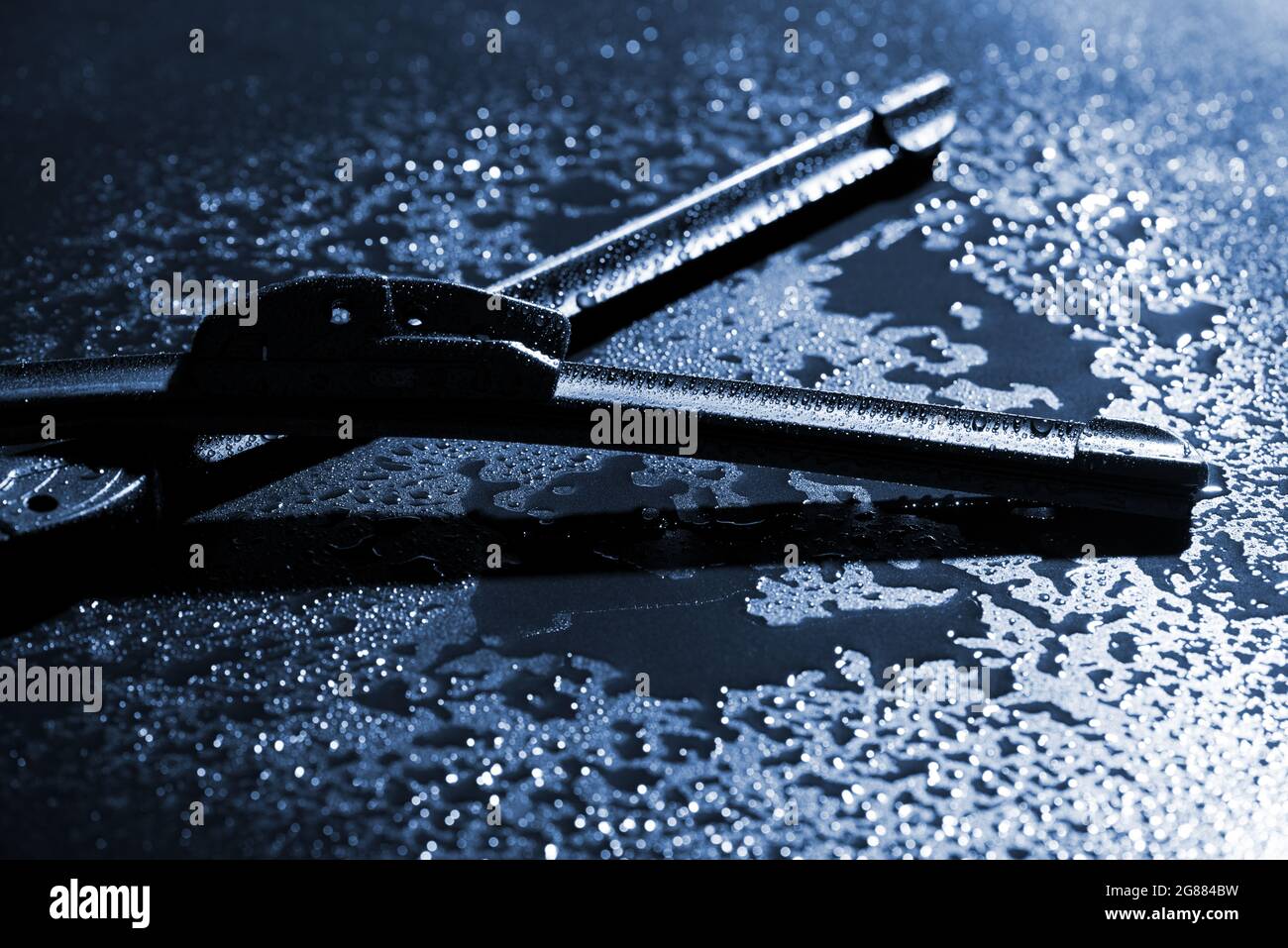 Closeup modern style of car windshield wiper Stock Photo - Alamy