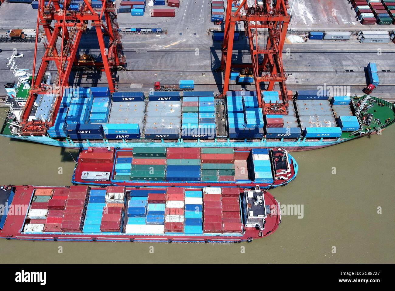 NANTONG, CHINA - JULY 18, 2021 - Large container ships dock at the ...