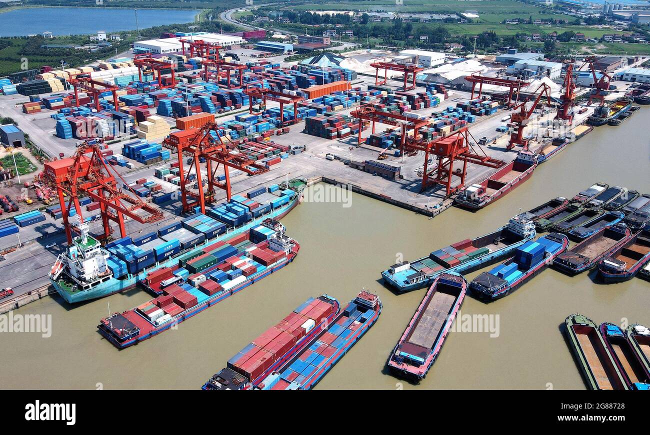 NANTONG, CHINA - JULY 18, 2021 - Large container ships dock at the ...