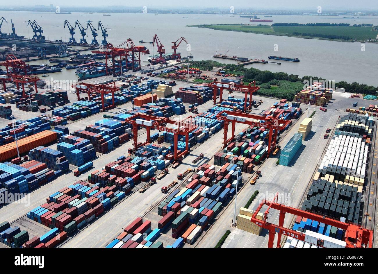 NANTONG, CHINA - JULY 18, 2021 - Large container ships dock at the ...