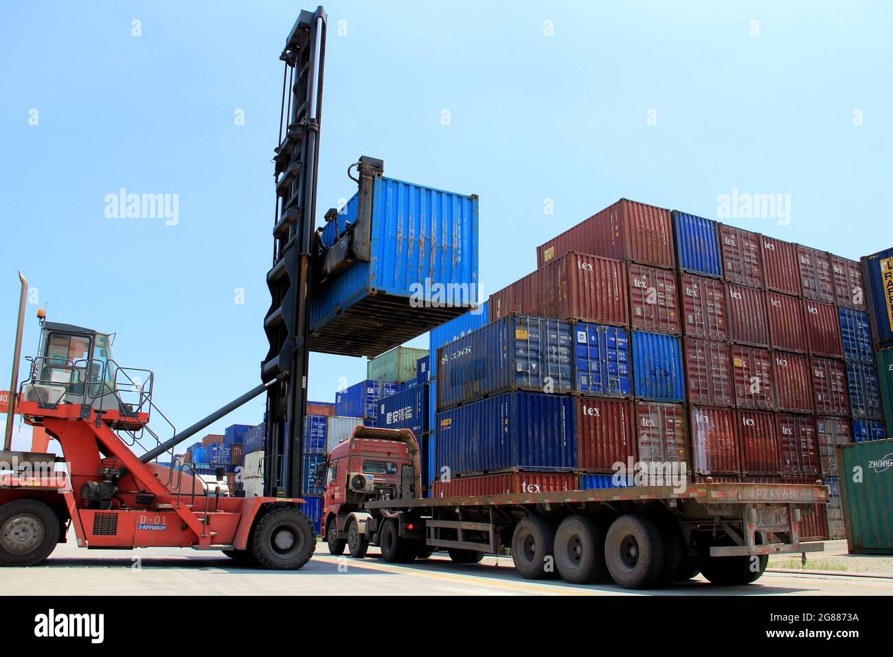 NANTONG, CHINA - JULY 18, 2021 - Large container ships dock at the berth of Rugao port group ...
