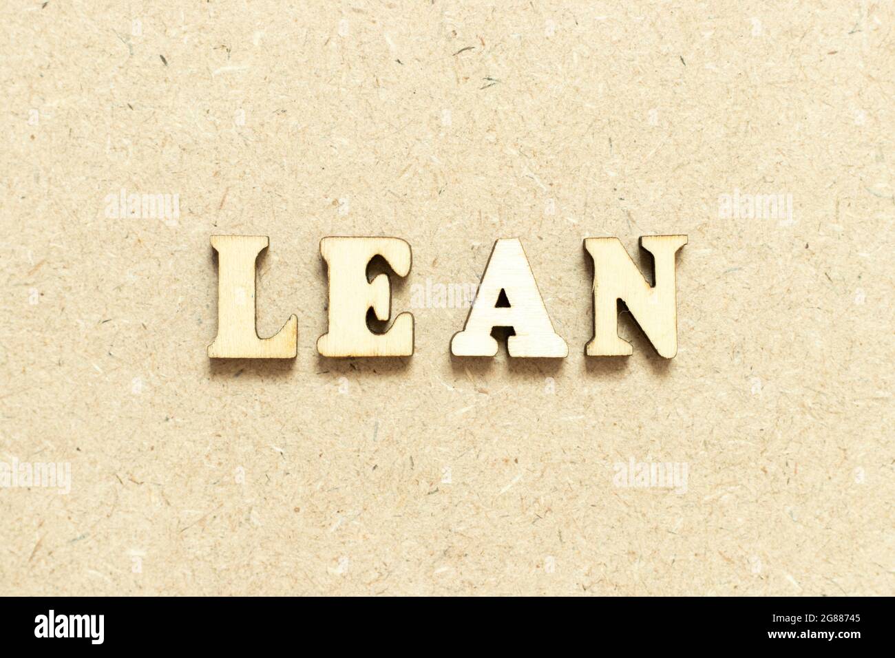 Alphabet letter in word lean on wood background Stock Photo - Alamy