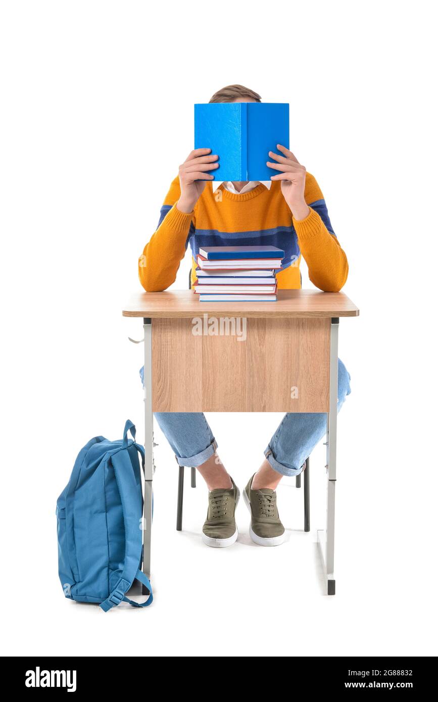 Boy study on desk Cut Out Stock Images & Pictures - Alamy