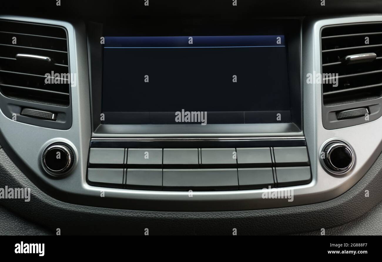 Modern radio on dashboard of car, closeup Stock Photo - Alamy