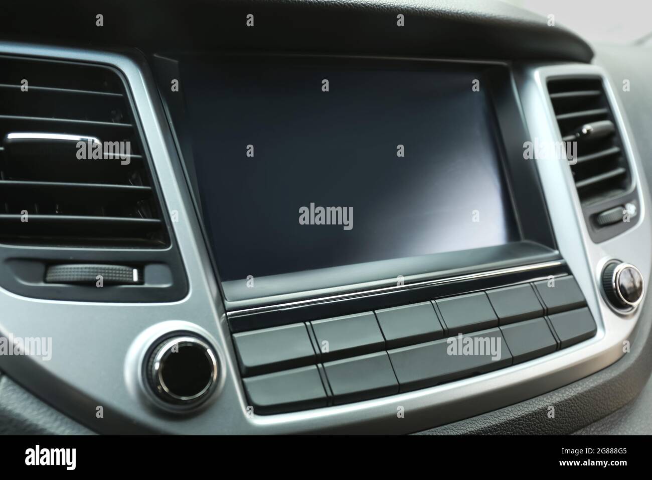 Modern radio on dashboard of car, closeup Stock Photo - Alamy