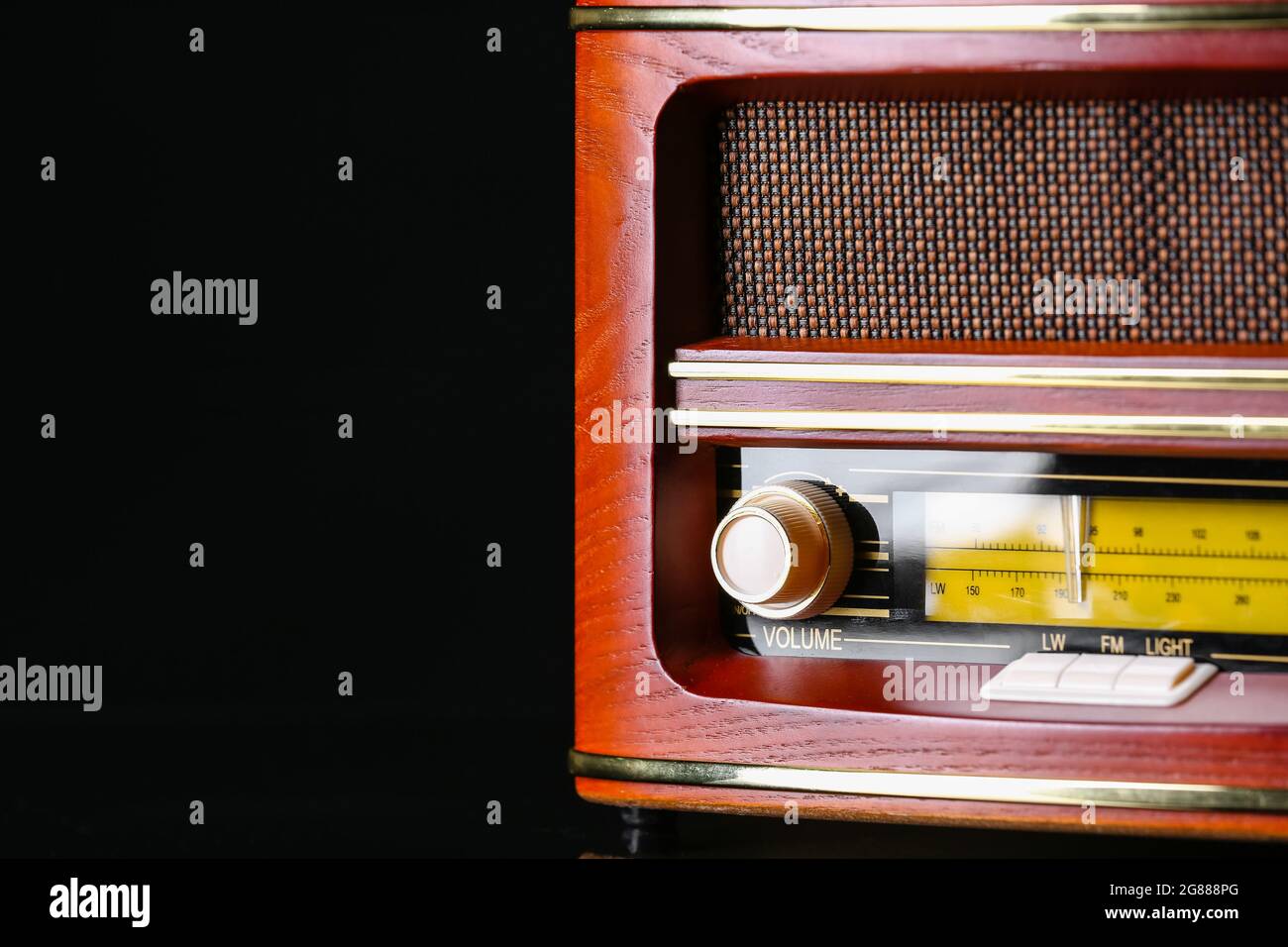 Retro radio receiver on dark background Stock Photo - Alamy