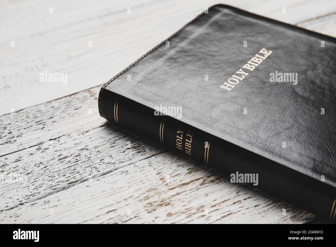 Holy Bible on light wooden background, closeup Stock Photo - Alamy