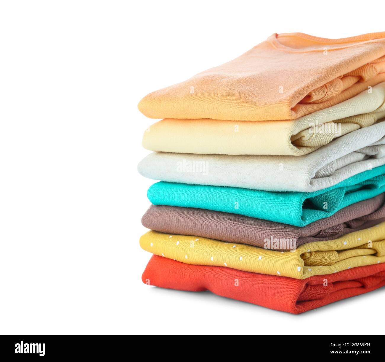 Stack of baby clothes on white background Stock Photo - Alamy