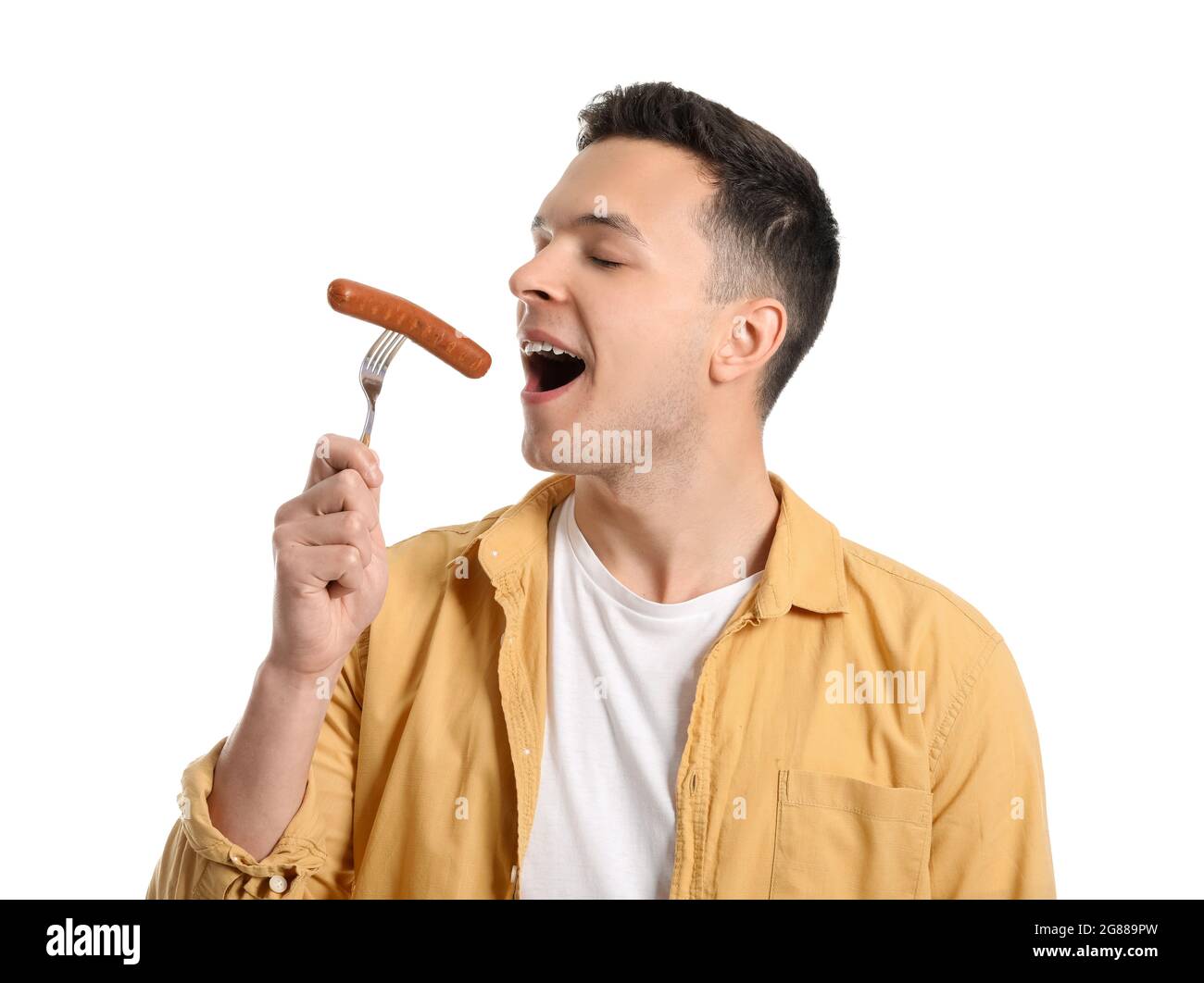 Young man tasty sausage hi-res stock photography and images - Alamy