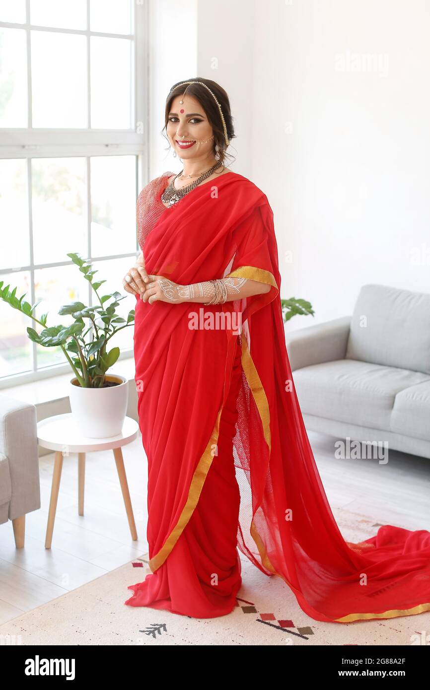 Beautiful Indian woman at home Stock Photo - Alamy