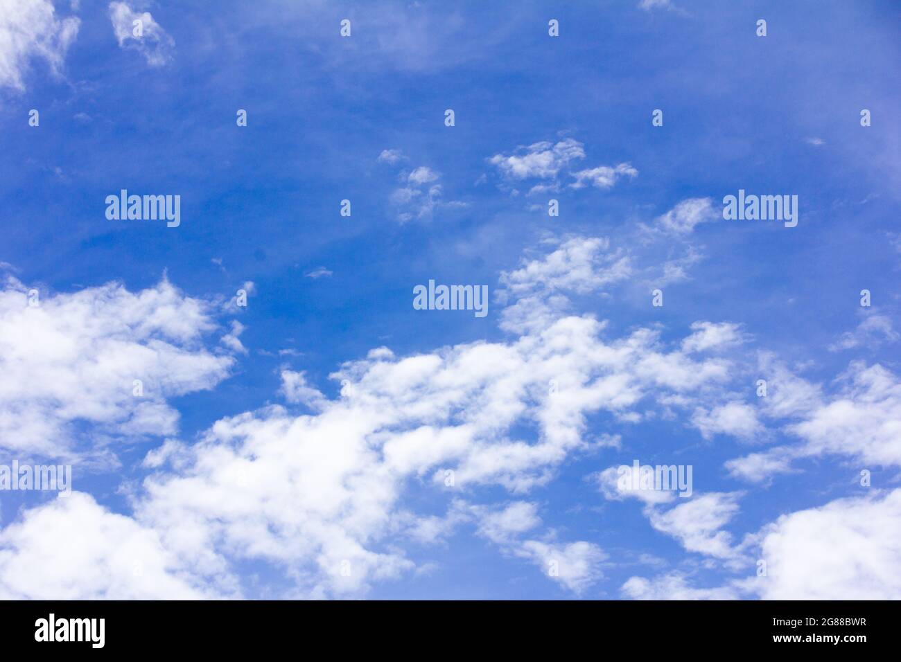 Clear blue color sky with white cloud background Stock Photo - Alamy