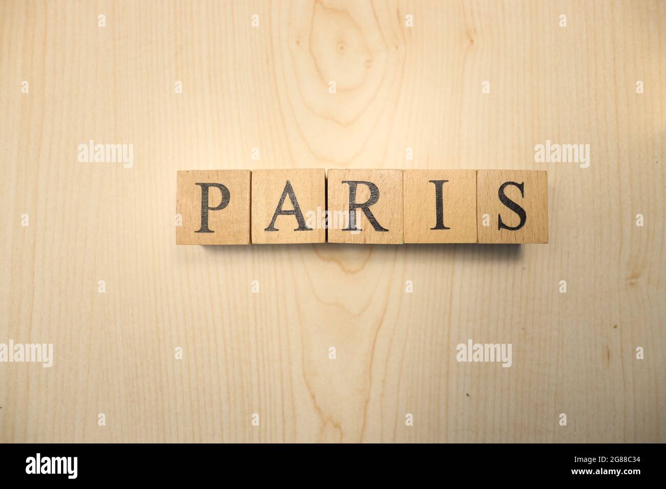 The word Paris was created from wooden letter cubes. Cities and words ...