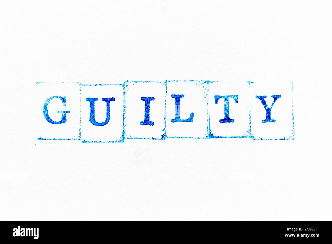 Blue color ink rubber stamp in word guilty on white paper background ...