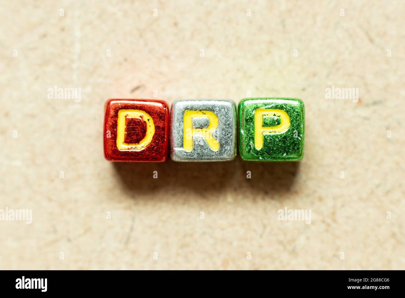 Metallic color alphabet letter block in word DRP (Abbreviation of ...
