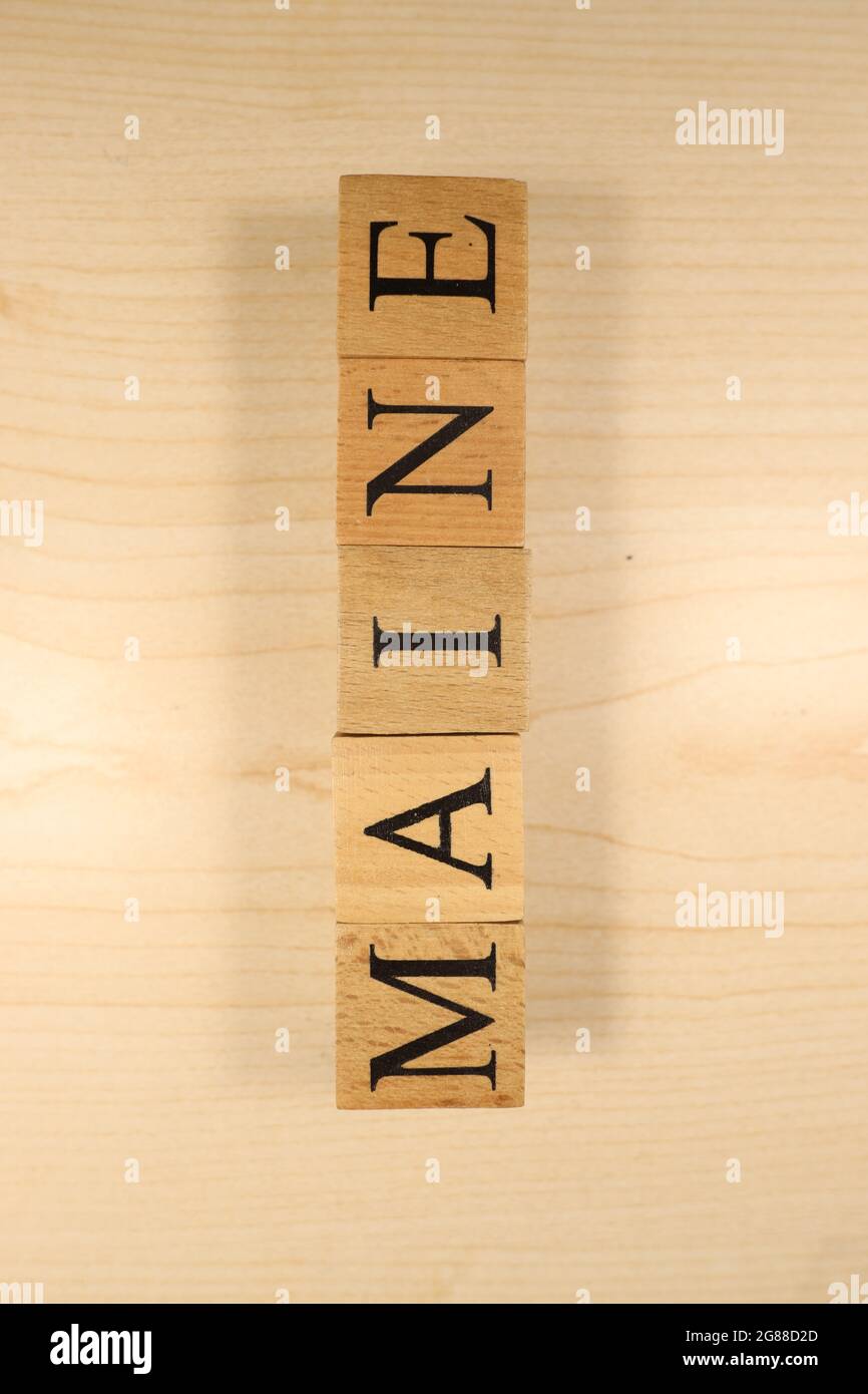 The word Maine was created from wooden letter cubes. Cities and words ...