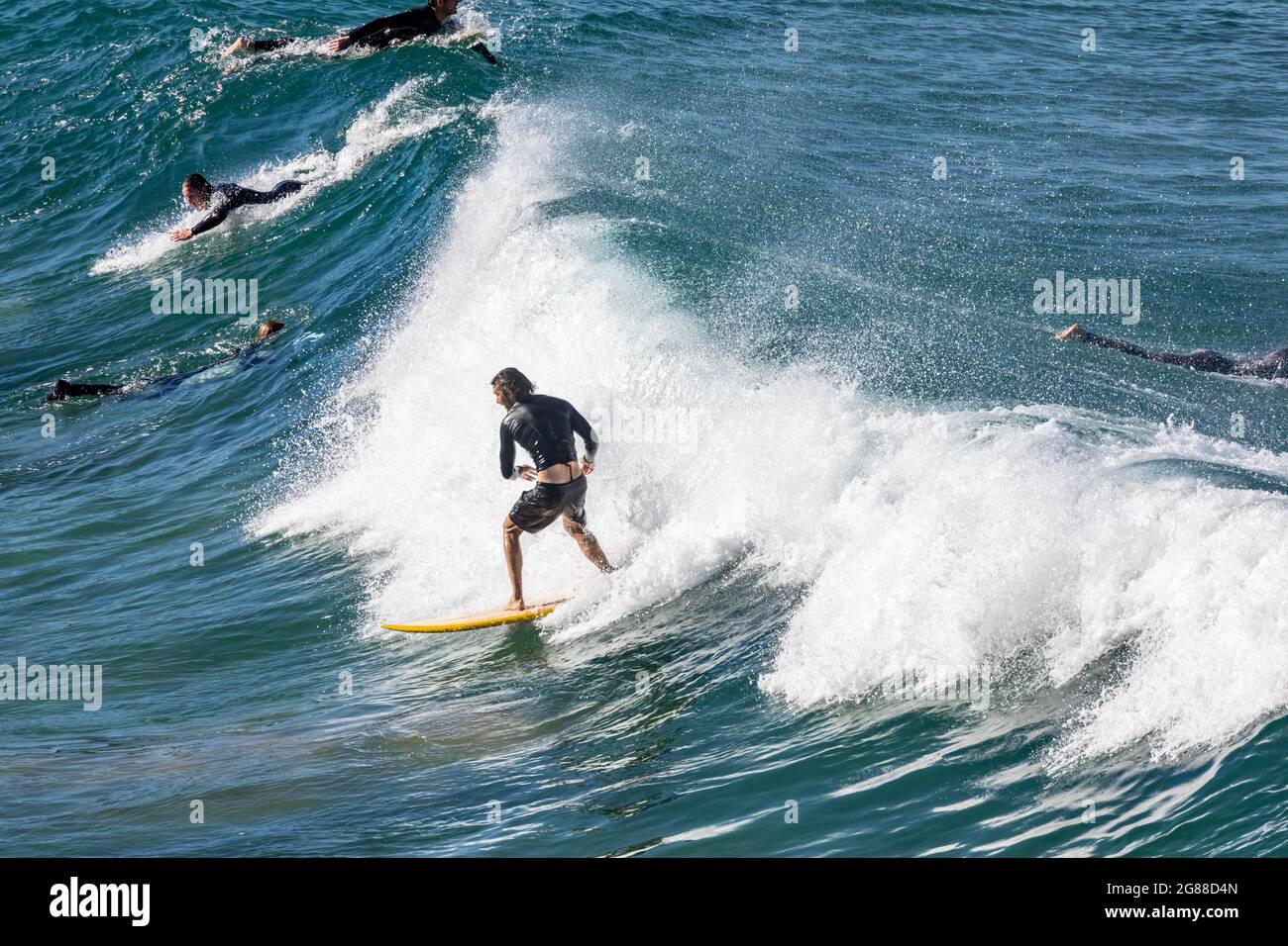 Wave surfing group hi-res stock photography and images - Alamy