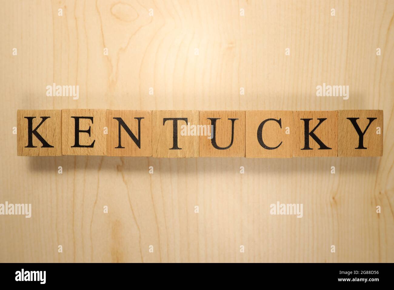 The word Kentucky was created from wooden letter cubes. Cities and ...