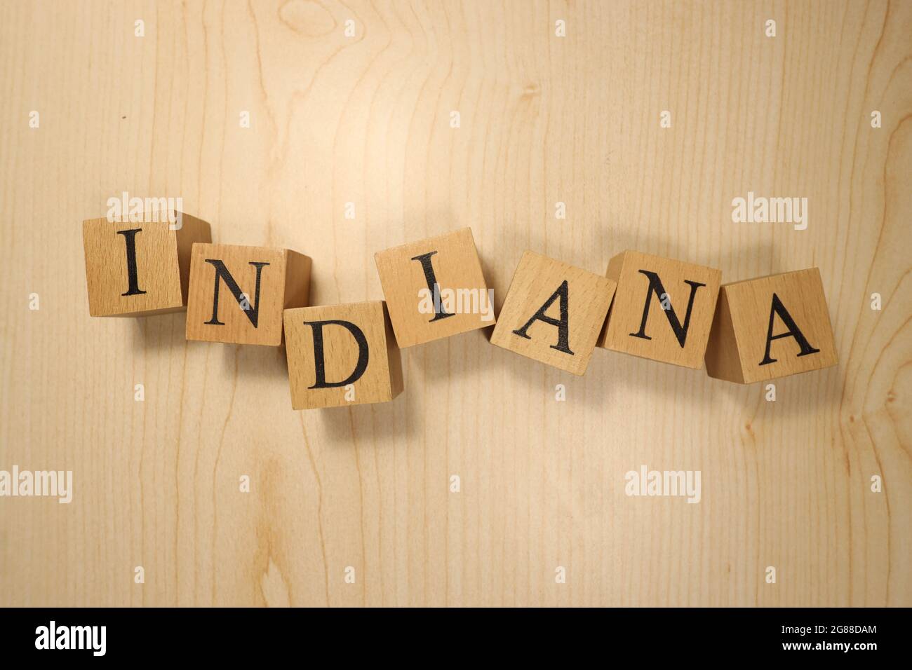 The word Indiana was created from wooden letter cubes. Cities and words ...